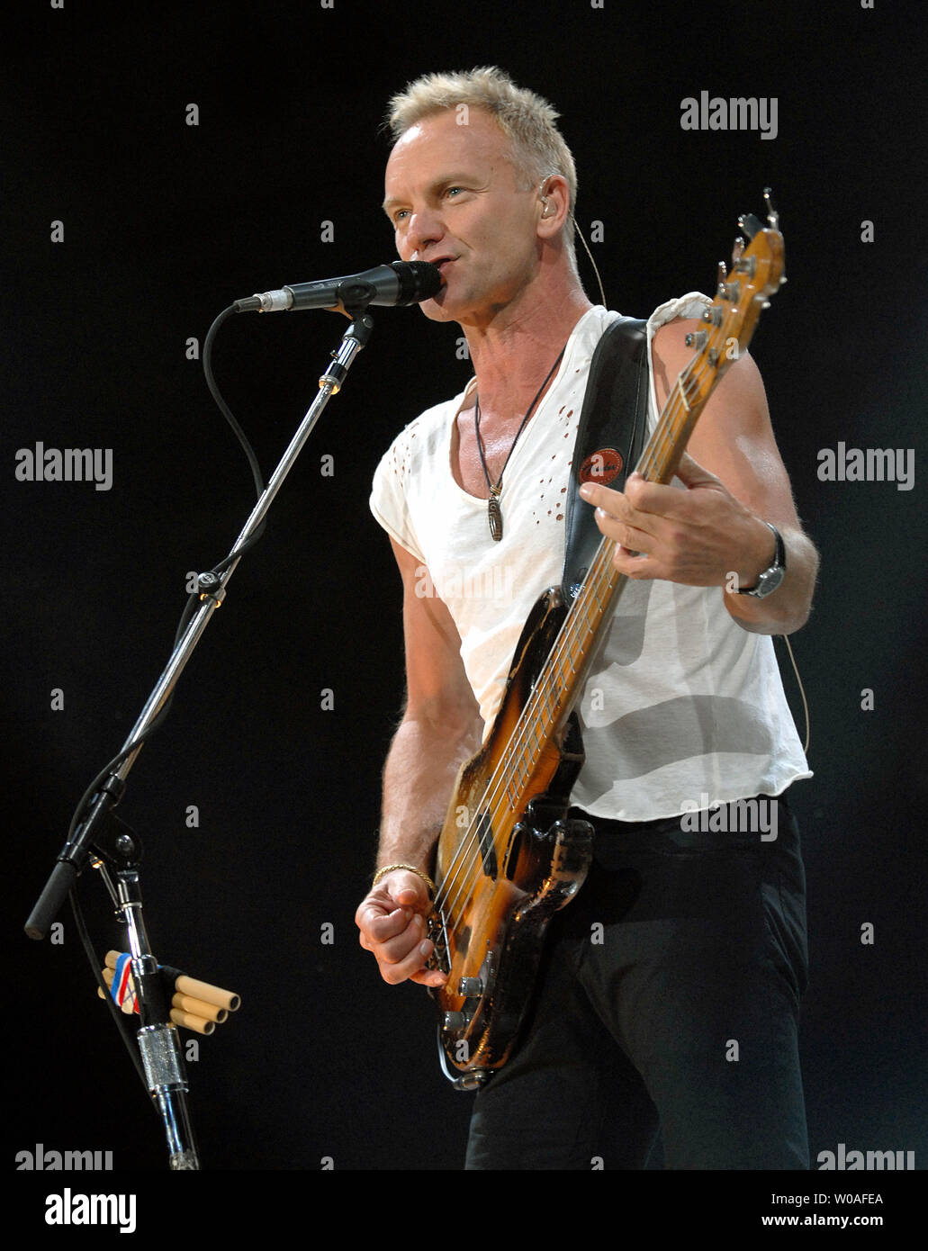 Police frontman and bassist Sting performs a song onstage in the first ...