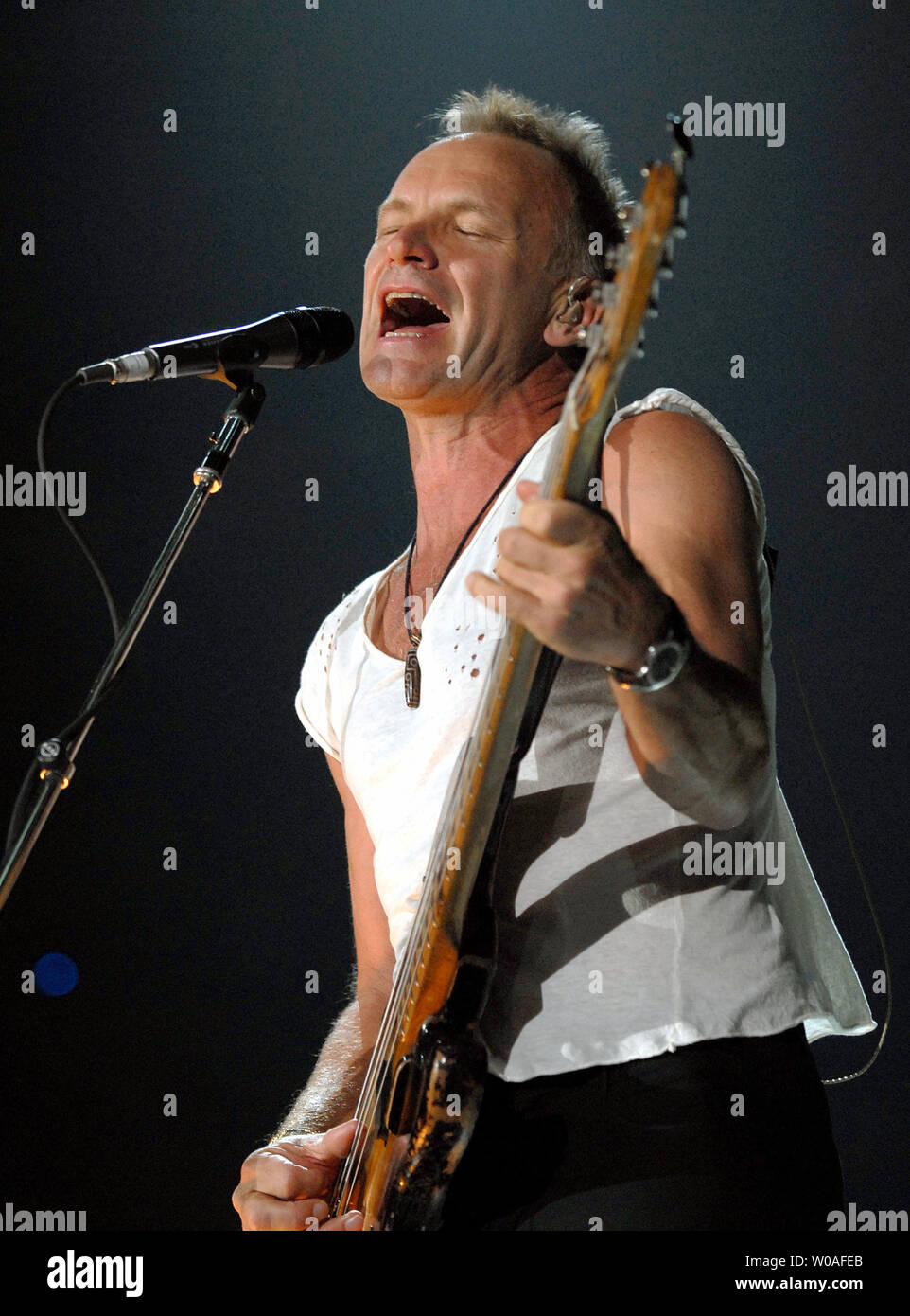 Police frontman and bassist Sting performs a song onstage in the first ...
