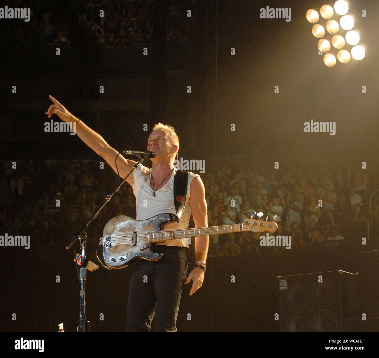 Police frontman and bassist Sting performs a song onstage in the first ...