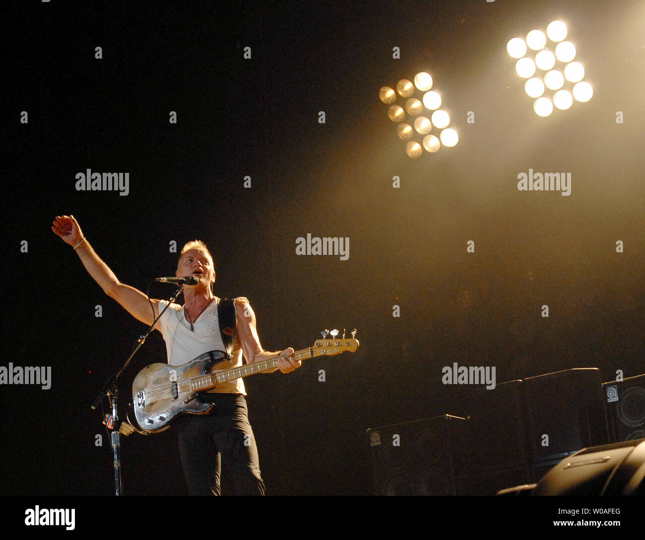 Police frontman and bassist Sting performs a song onstage in the first ...