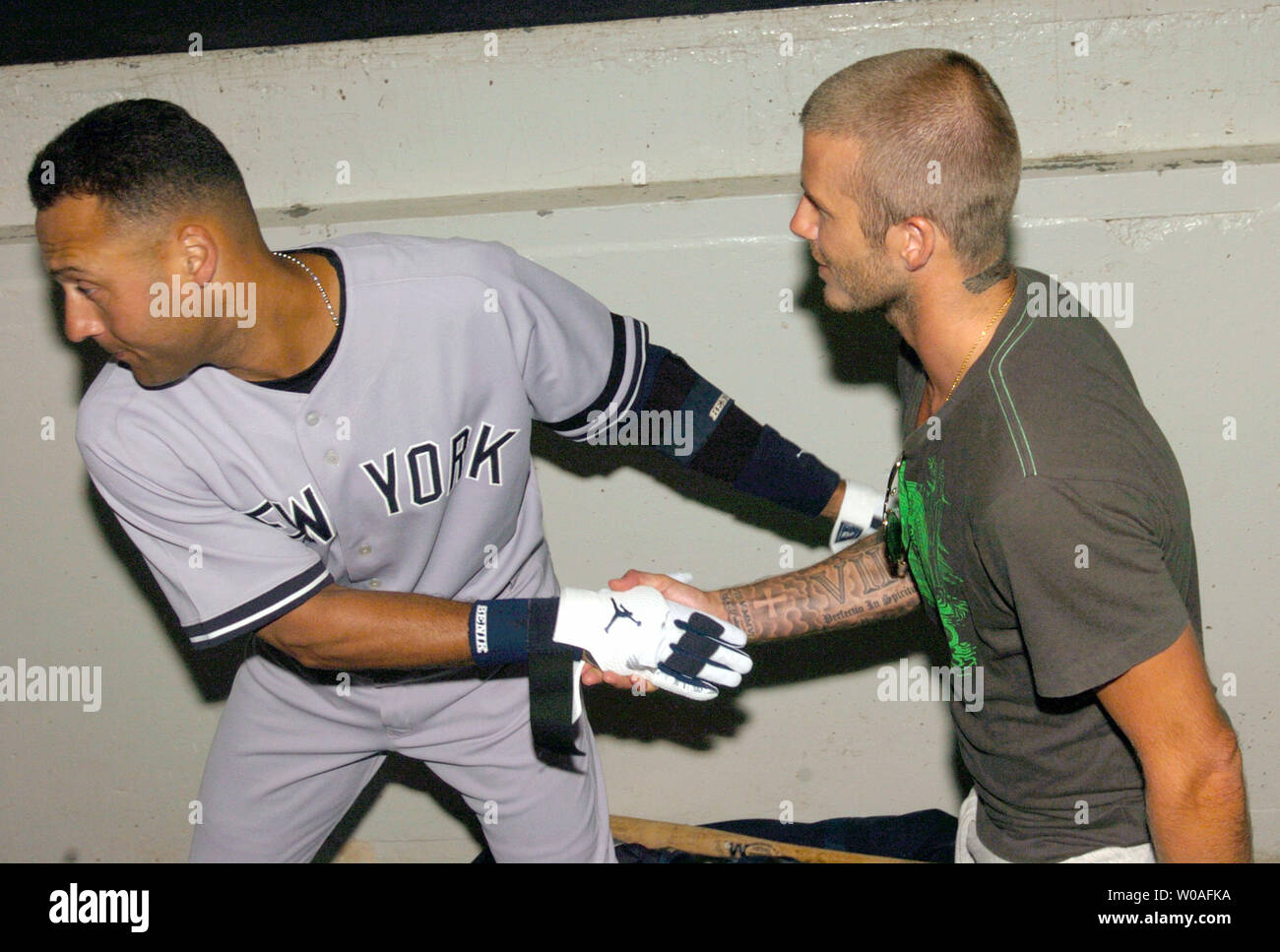 Soccer star David Beckham (R) of the L.A. Galaxy shakes hands with New ...