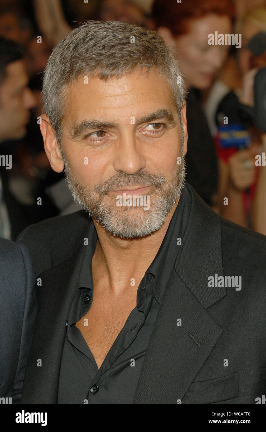 George Clooney arrives at Roy Thomson Hall for the world premiere gala ...