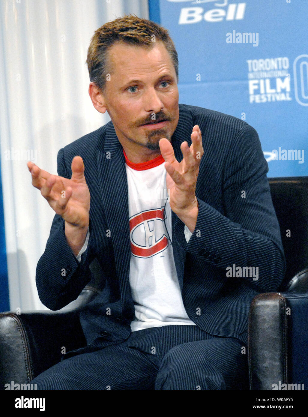 Actor Viggo Mortensen answers a question from the media at a press ...