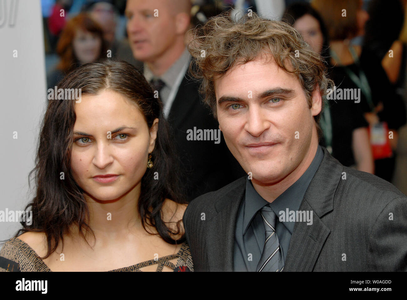 Joaquin Phoenix (R) arrives with his sister Rain Phoenix for the world ...