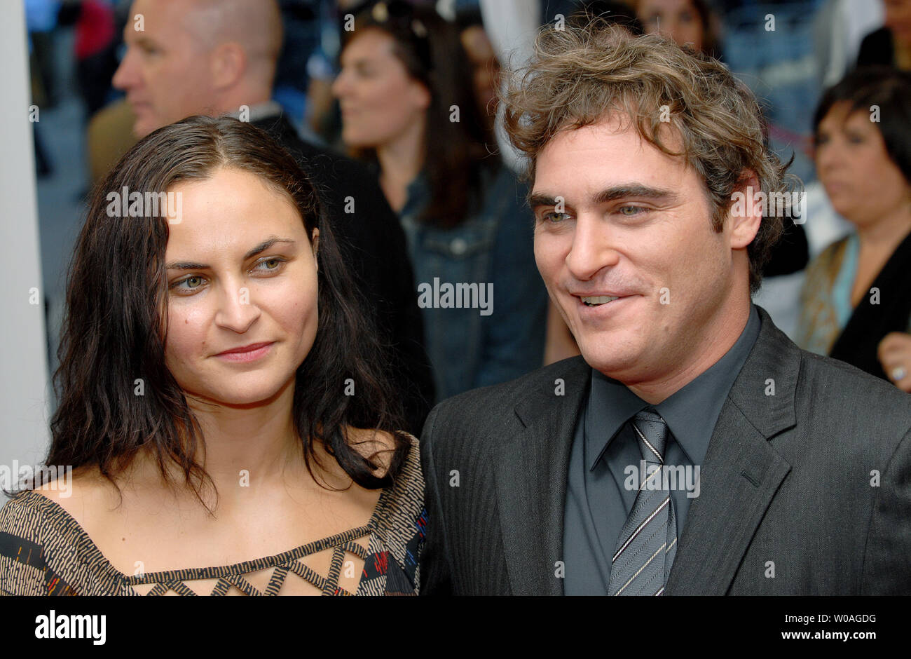 Joaquin Phoenix (R) arrives with his sister Rain Phoenix for the world ...