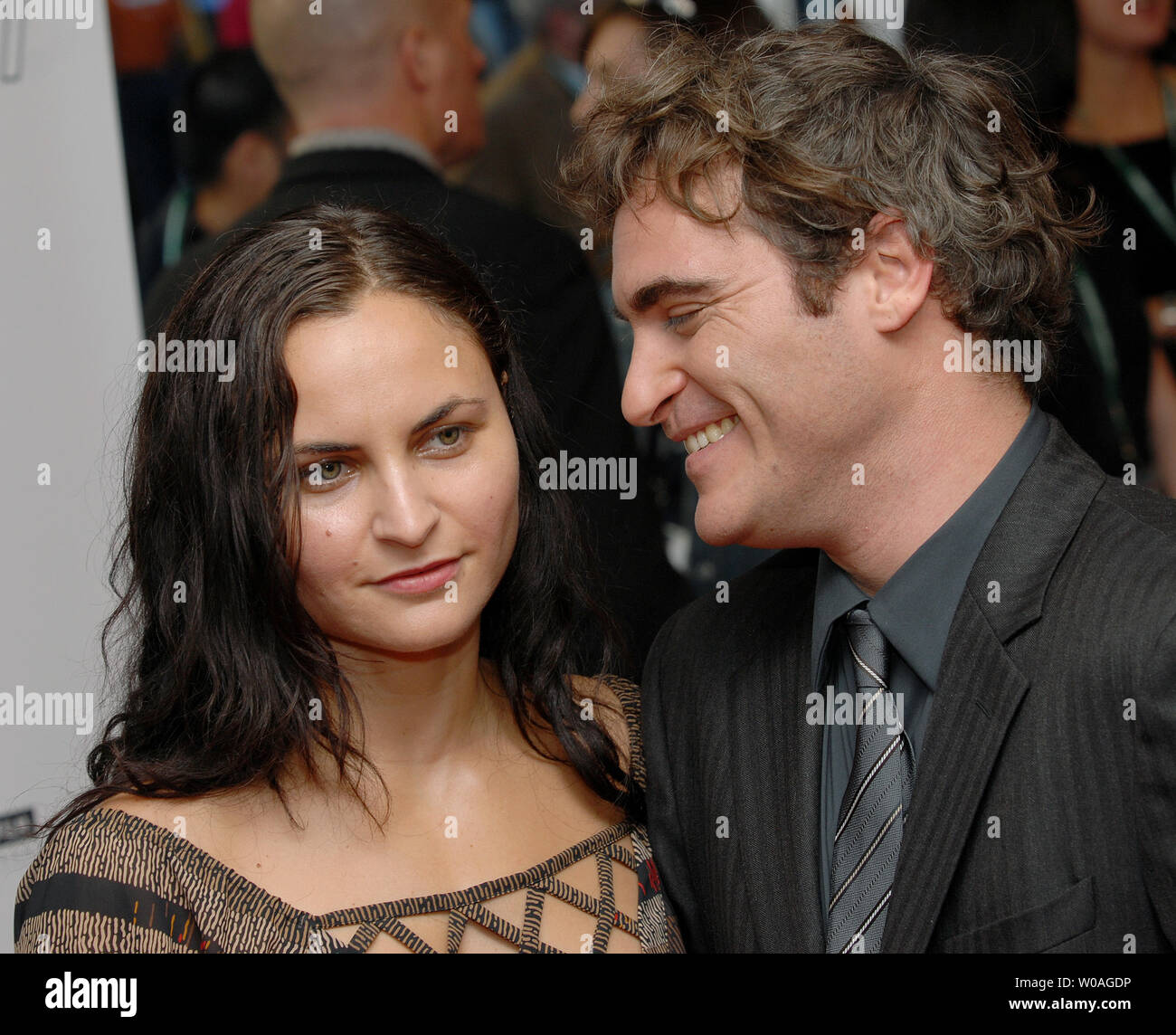 Joaquin Phoenix (R) arrives with his sister Rain Phoenix for the world ...