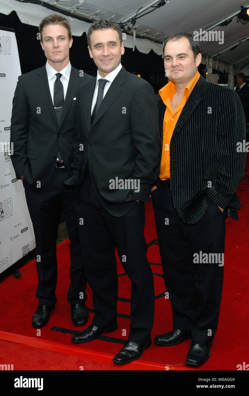 (L-R) Actors Stephen Amell, Allan Hawco and Dylan Roberts arrive for ...