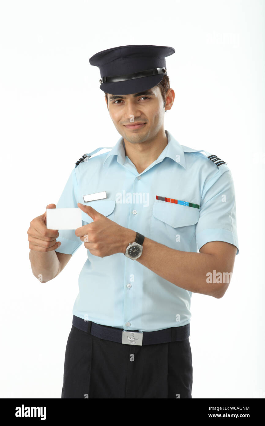 Portrait of an Indian pilot showing a card Stock Photo - Alamy