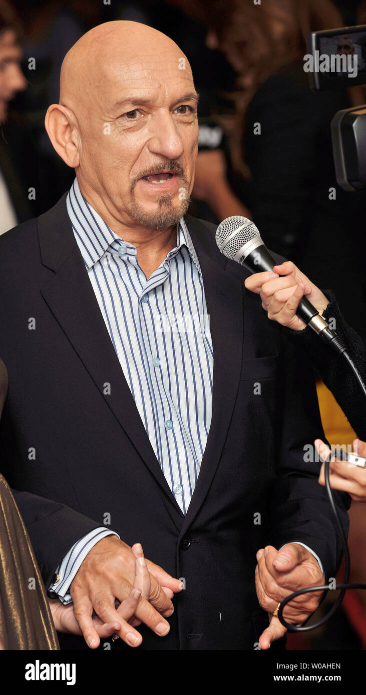 Sir Ben Kingsley speaks with television reporters on the red carpet as ...