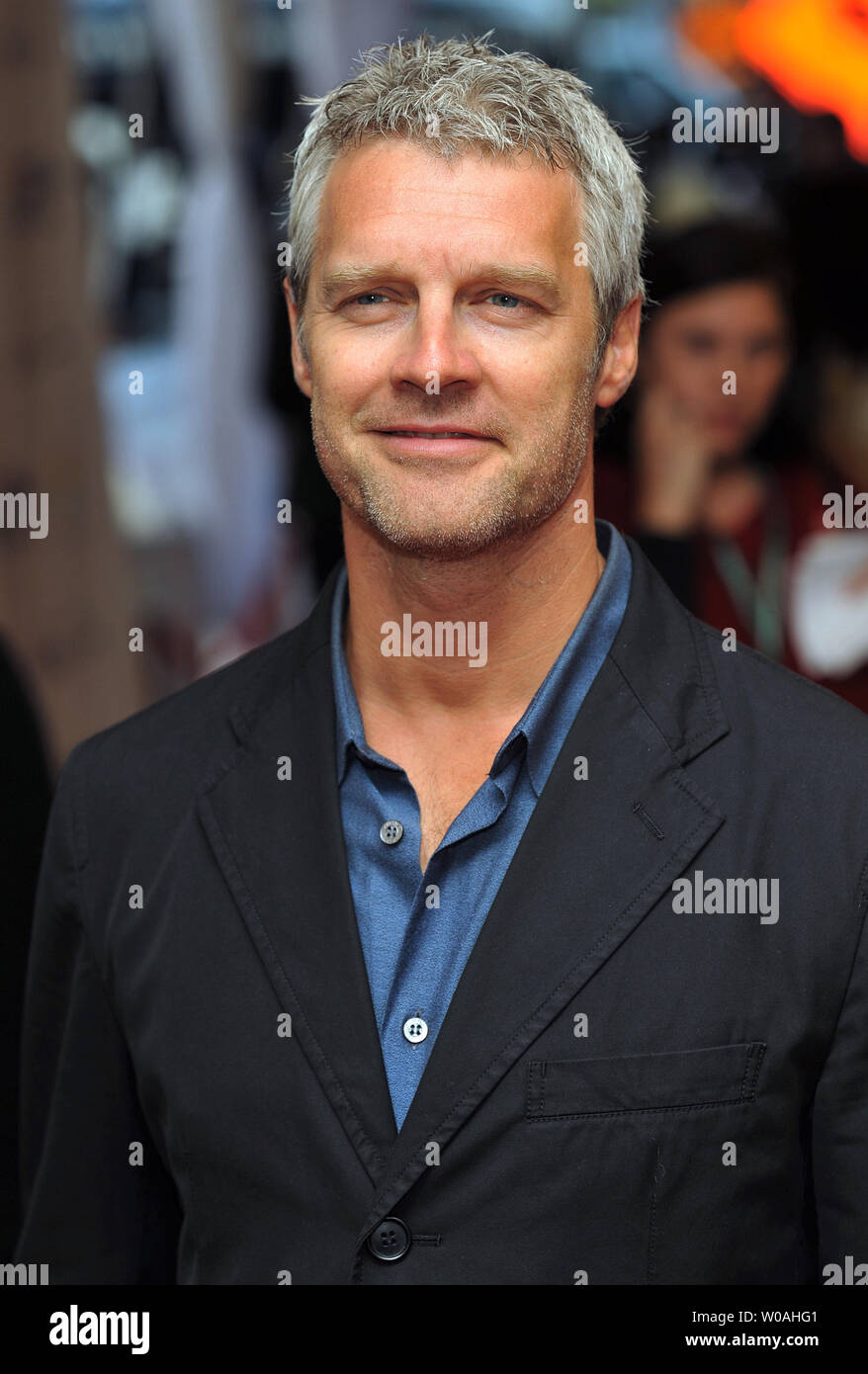 Director Neil Burger arrives for the world premiere of "The Lucky Ones ...