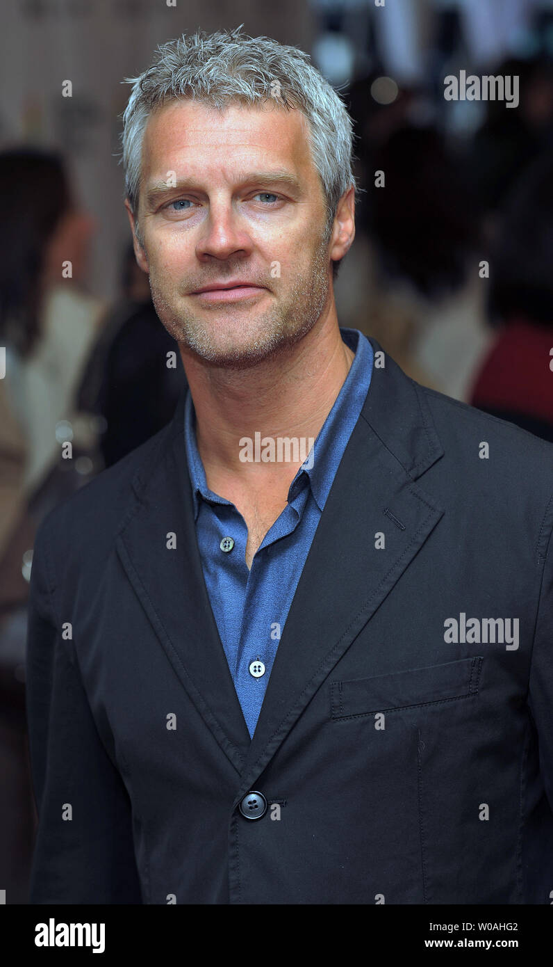 Director Neil Burger arrives for the world premiere of "The Lucky Ones ...