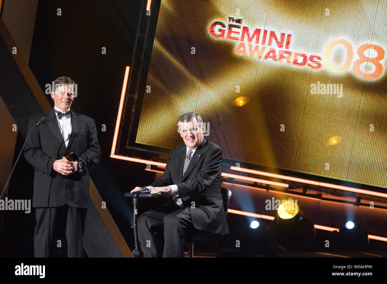 CityTV's Gord Martineau (L) receives the Humanitarian Award from ...