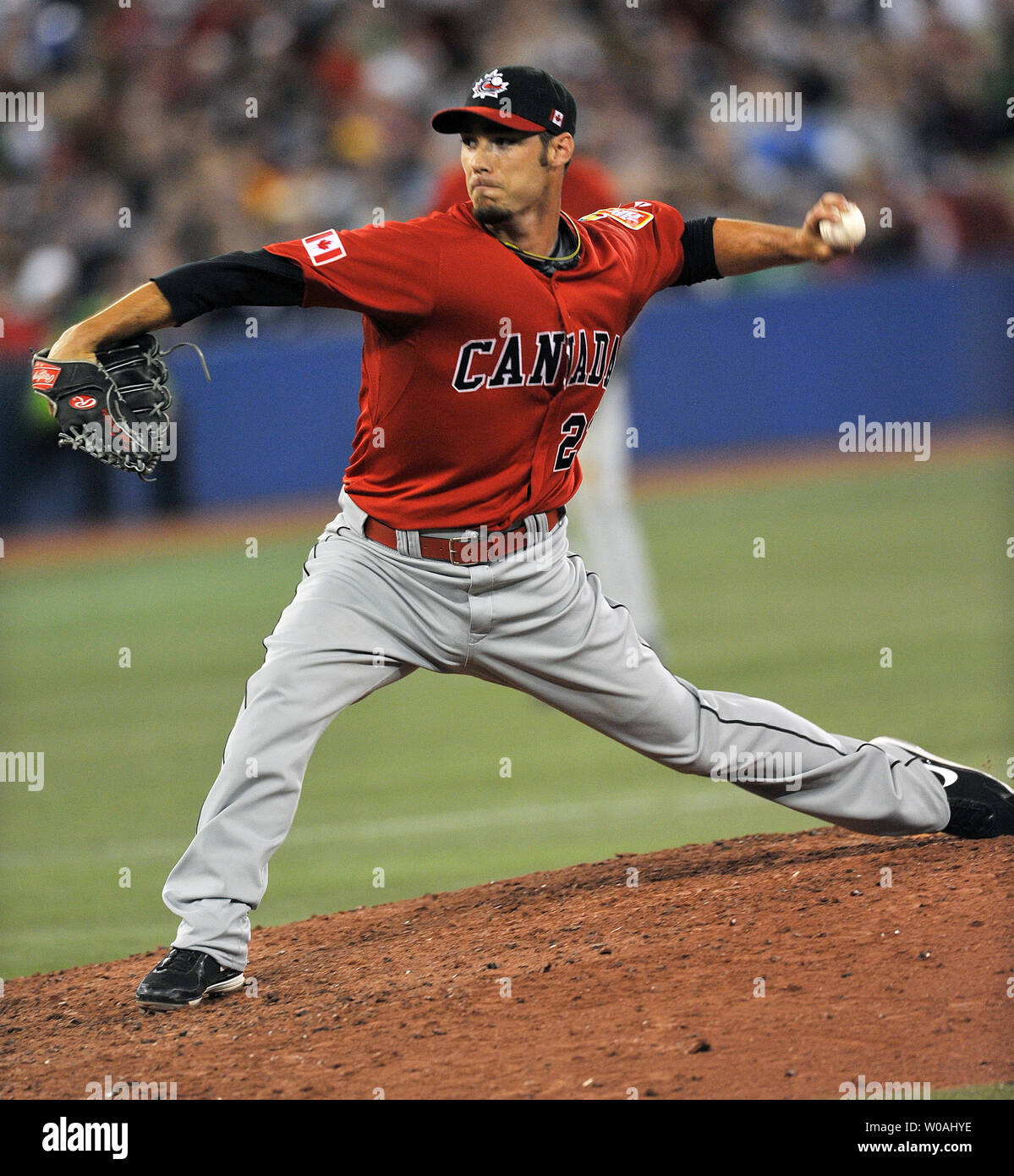 Team Canada pitcher David Davidson goes to work against Team USA in ...