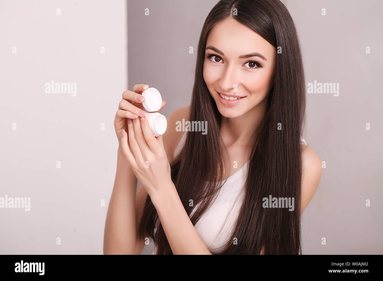 beauty, people, cosmetics, skincare and health concept - happy smiling ...