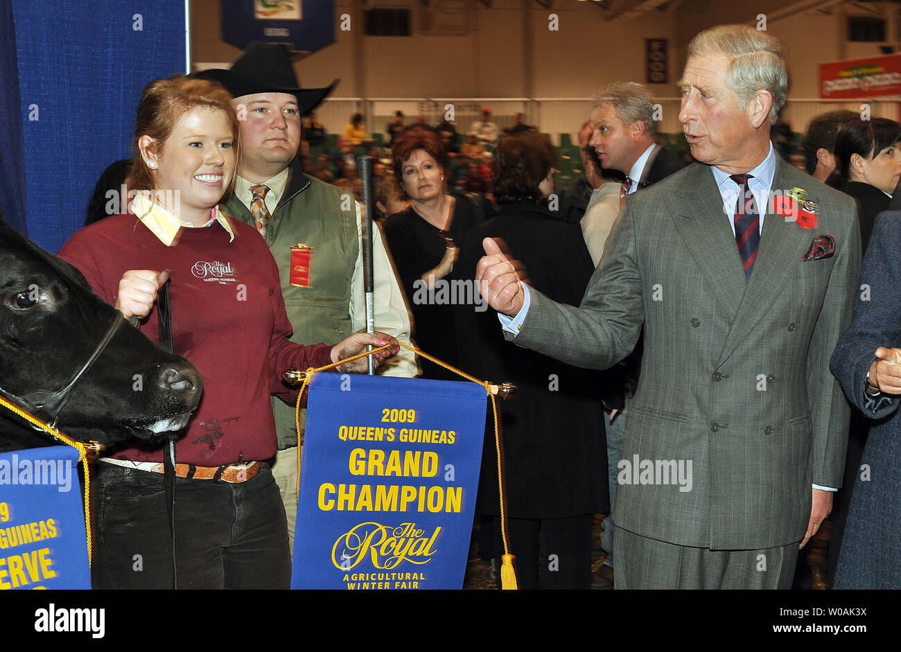Britain's Prince Charles presents the Championship ribbon to the ...