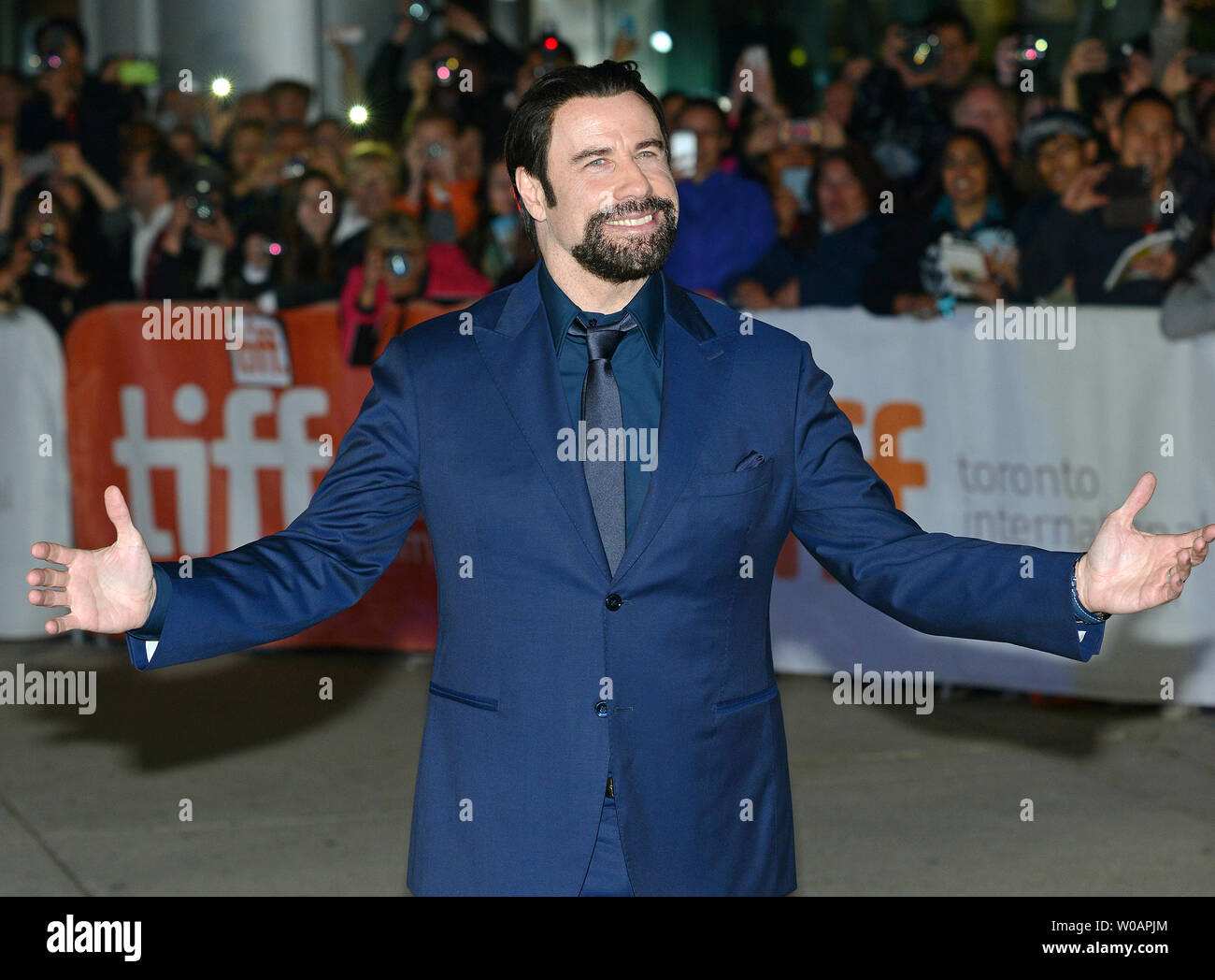 John Travolta arrives at the world premiere of 'The Forger' at Roy ...