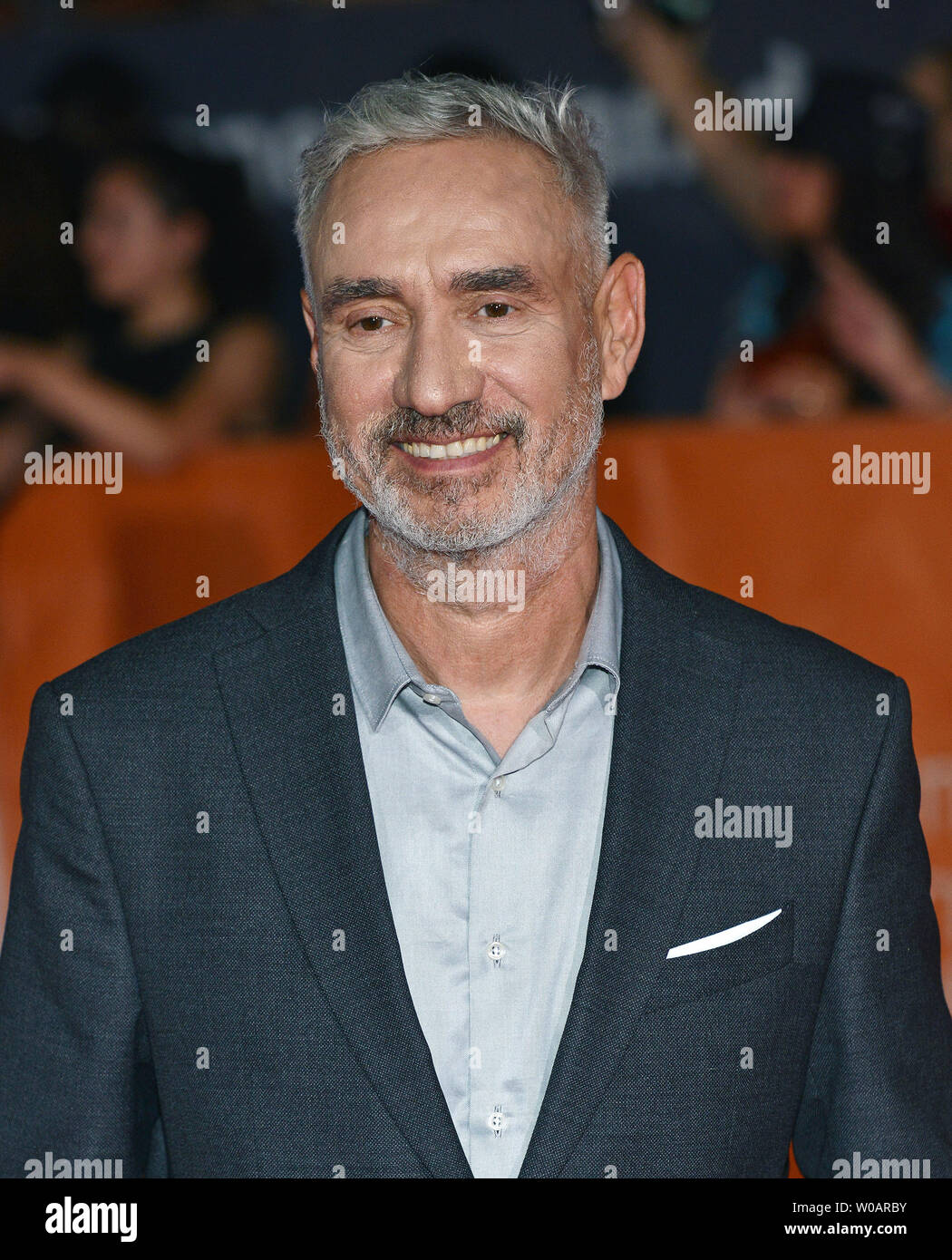 Director Roland Emmerich arrives at the world premiere of 'Stonewall ...
