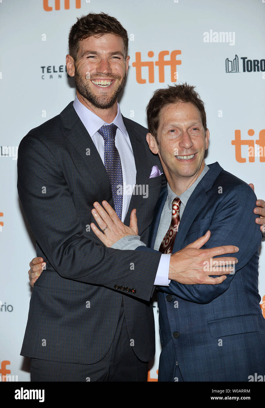Actors Austin Stowell (L) and Tim Blake Nelson arrive at the Toronto ...