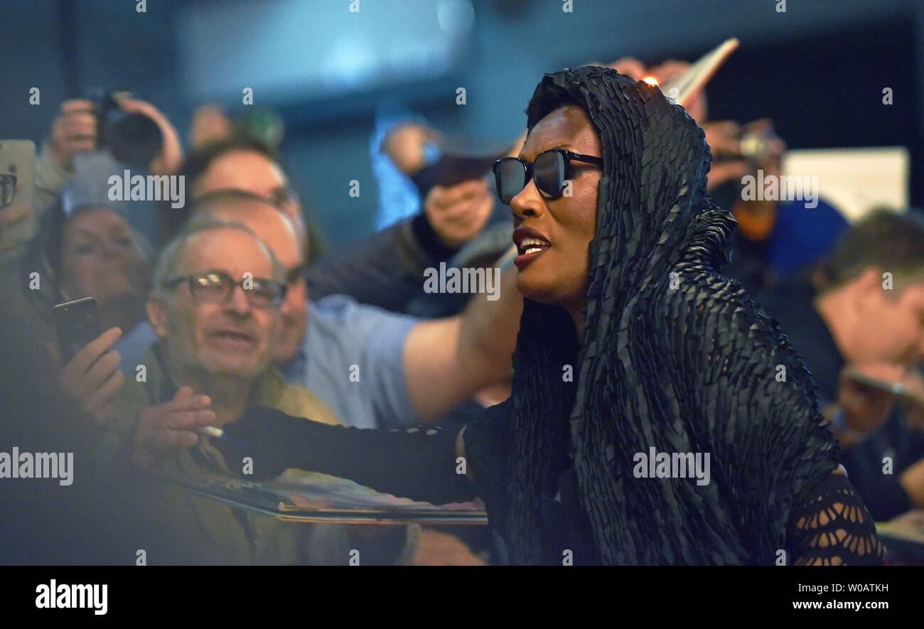 Grace Jones signs autographs for fans as she arrives at the world ...