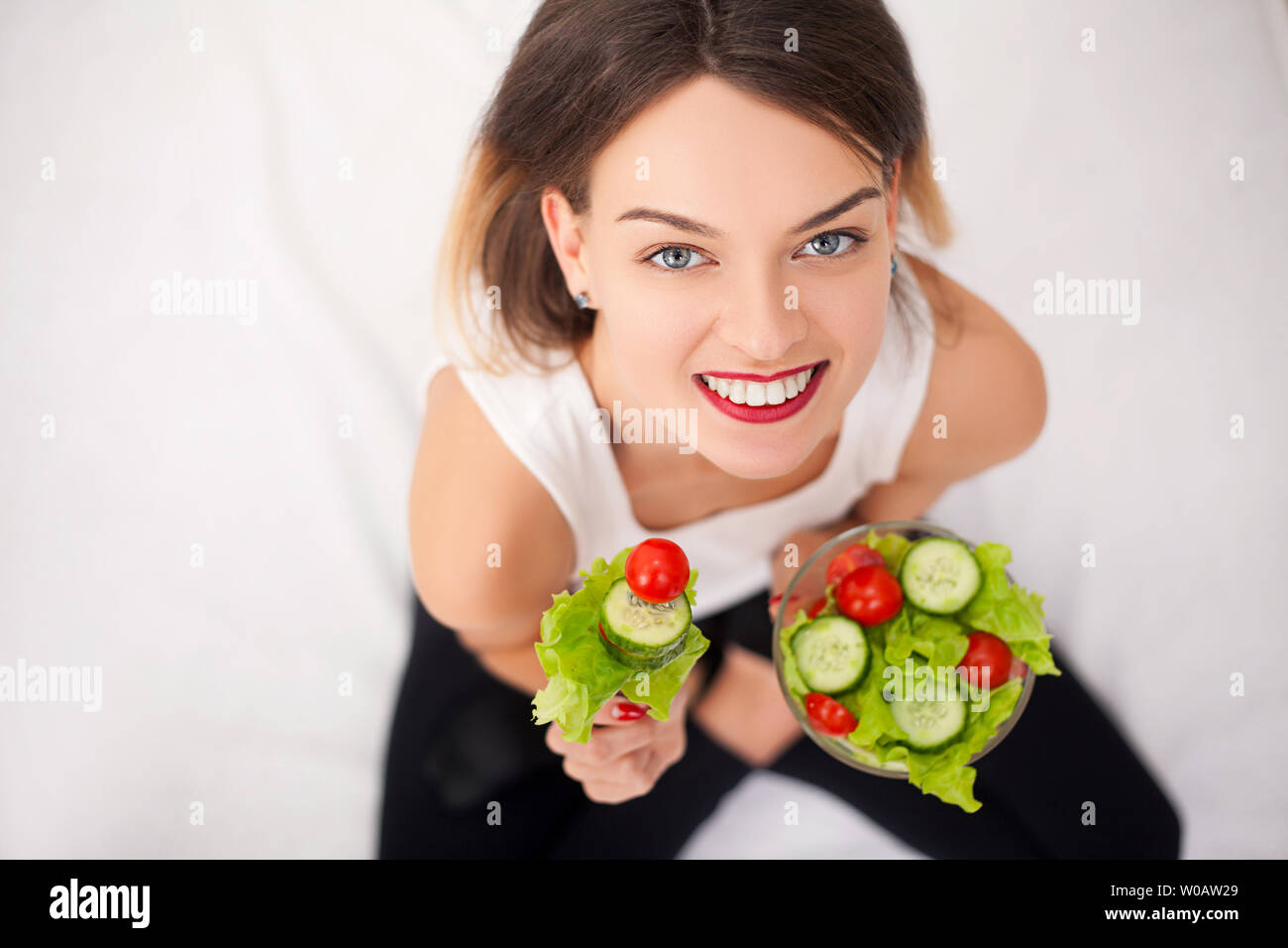 Person eating food after gym hi-res stock photography and images - Alamy