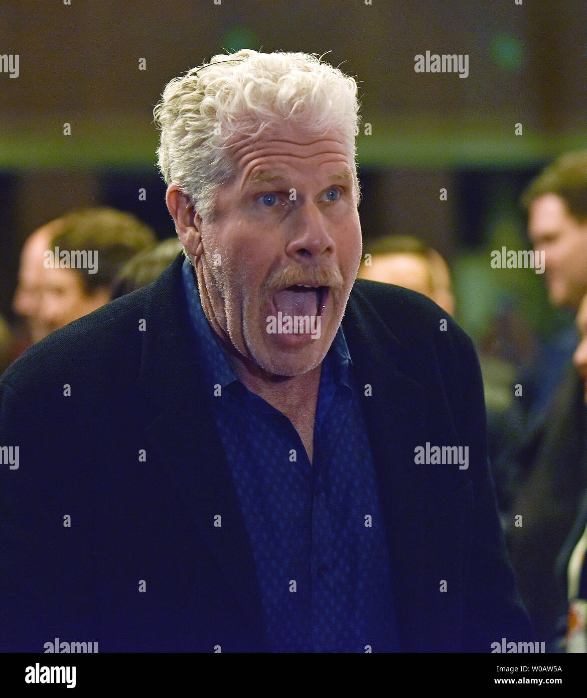 Ron Perlman reacts as he sees Doug Jones on the red carpet as they both ...