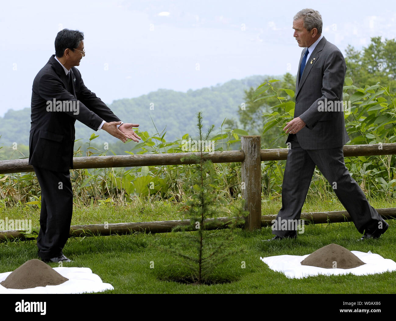 Prime Minister of Japan Yasuo Fukuda (L) welcomes U.S. President George ...
