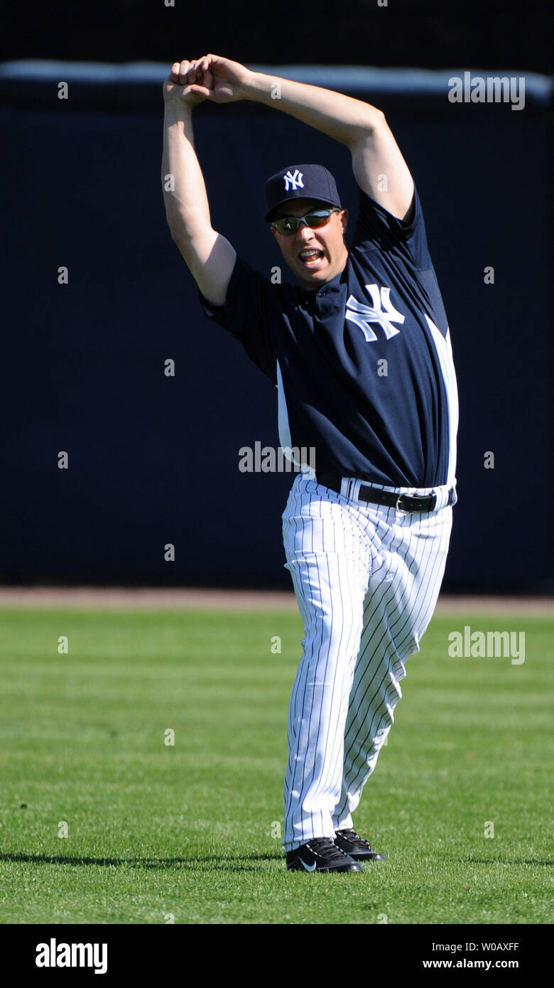 New York Yankees' first baseman Mark Teixeira stretches during spring ...