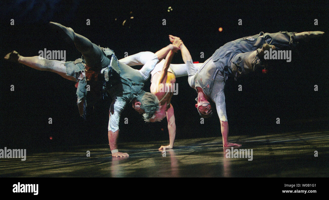 Acrobats dressed like the cast of Les Miserables in Banquine entertain ...