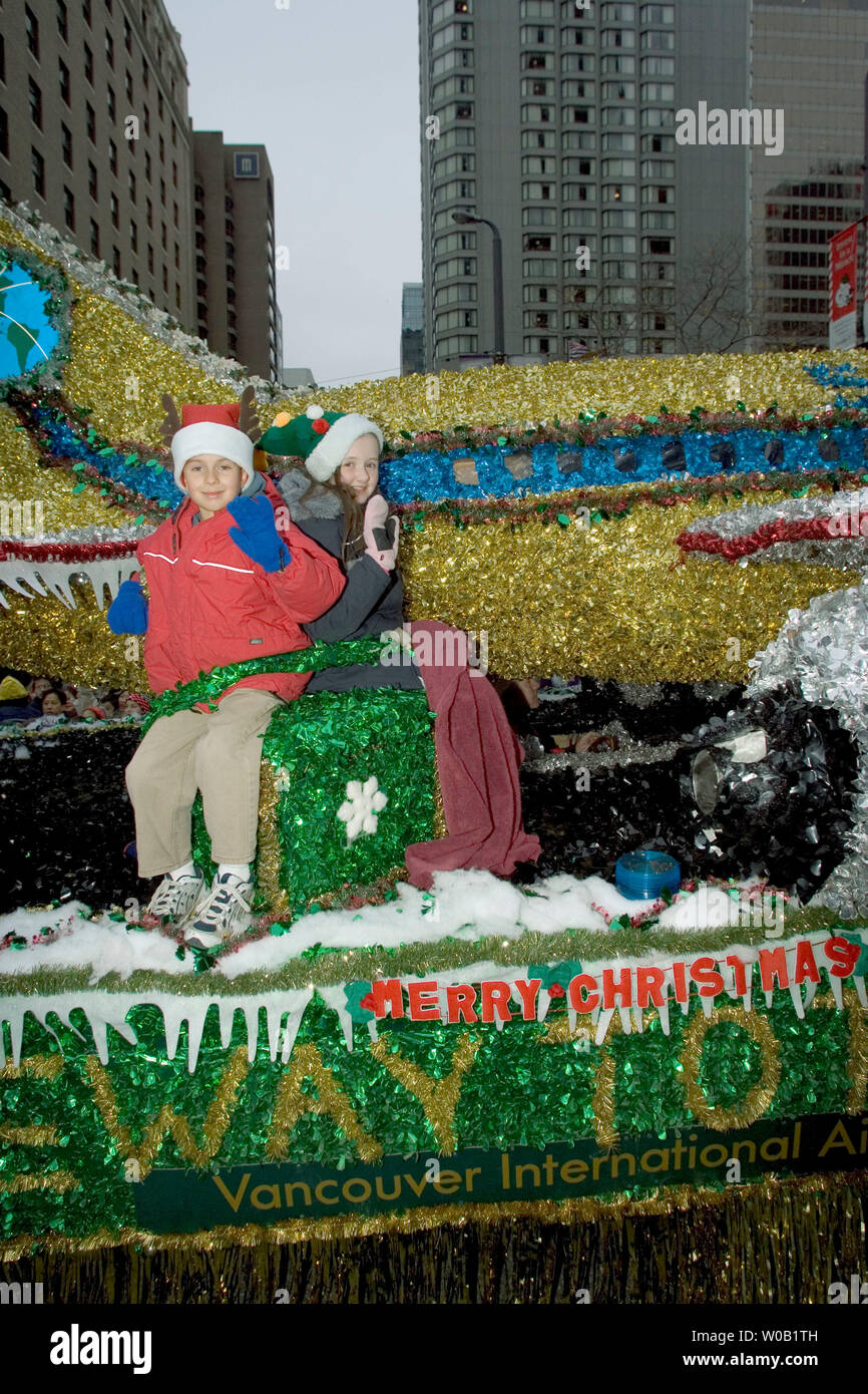 The Vancouver International Airport float moves past thousands of ...