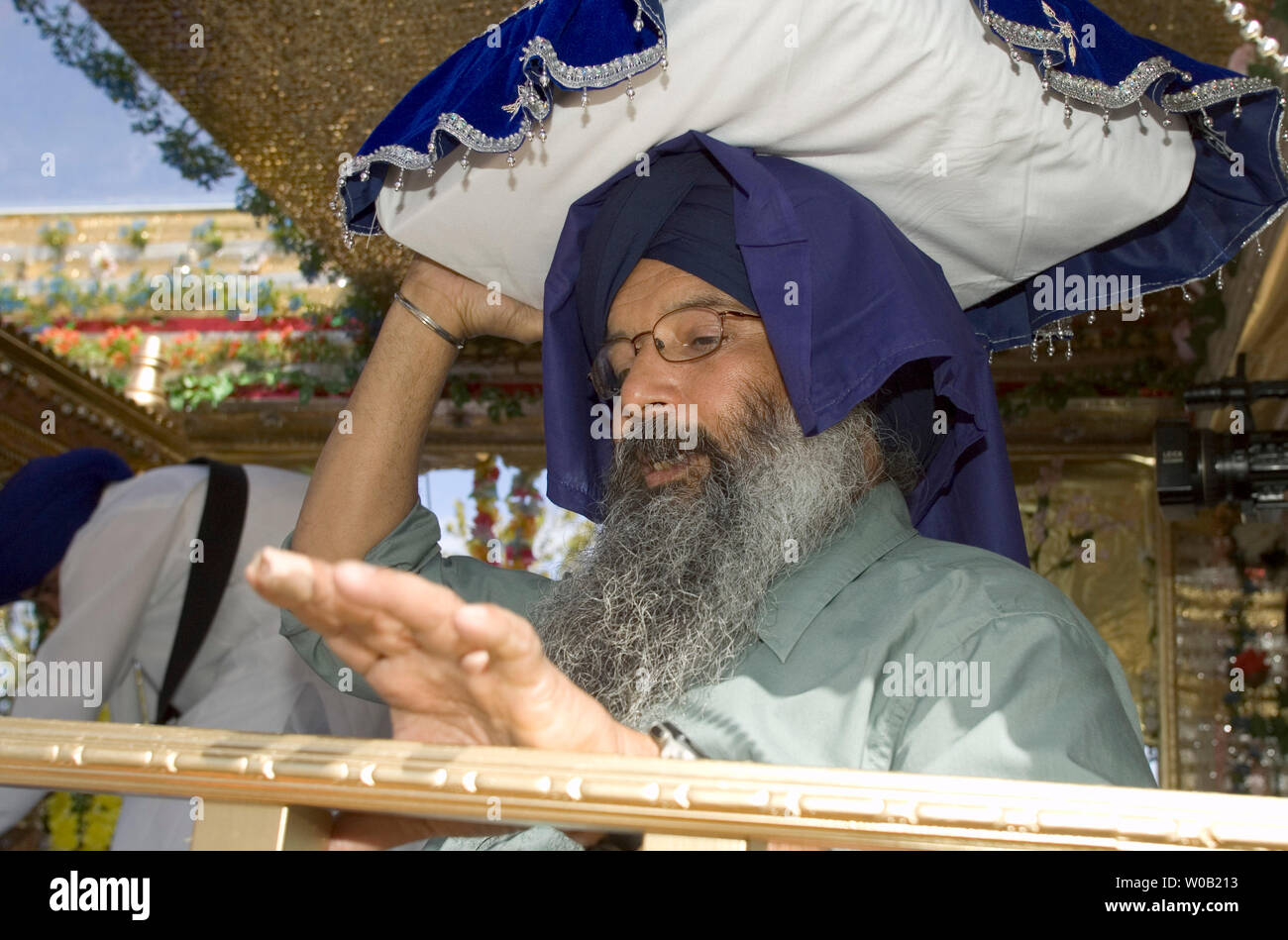 Holy khalsa artifacts are safely aboard the temple lead float as tens ...