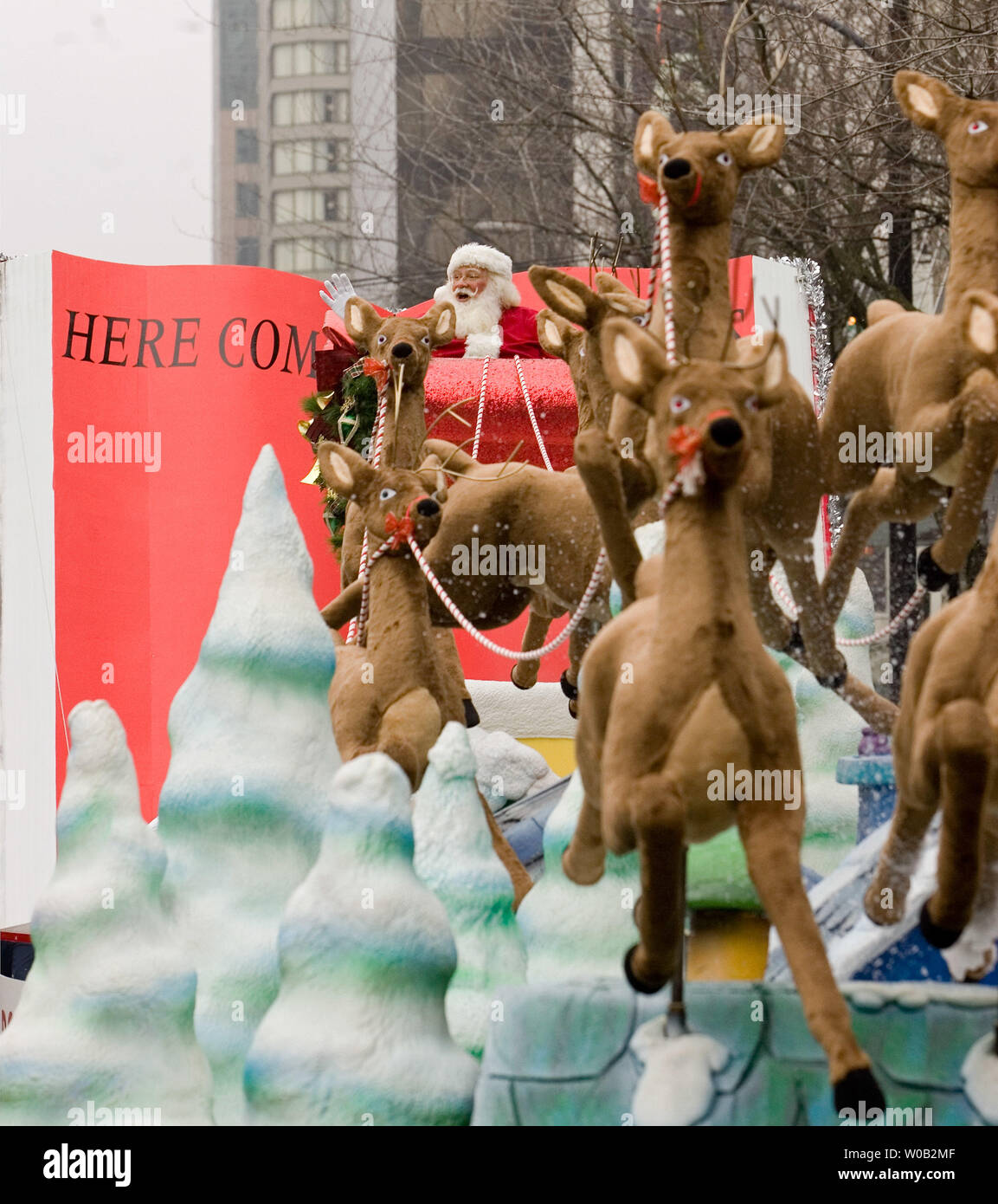 Santa Claus and his reindeer bring up the rear of the annual Roger's ...