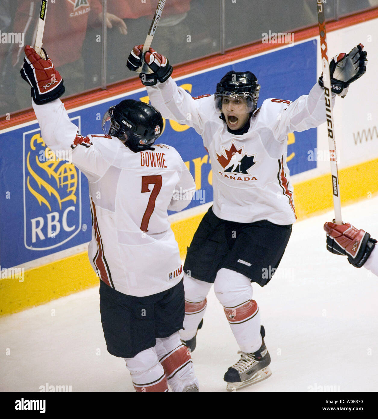 Team Canada's Blake Comeau (R, assist) celebrates team mate Steve ...