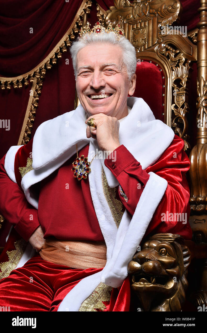 Man in red cloak hi-res stock photography and images - Alamy