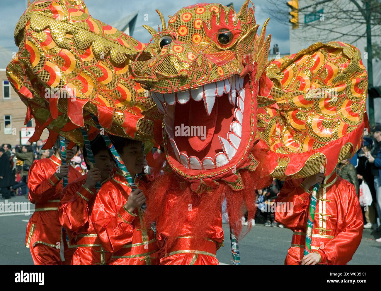 A dragon float coils as it moves through Chinatown for the Chinese New ...