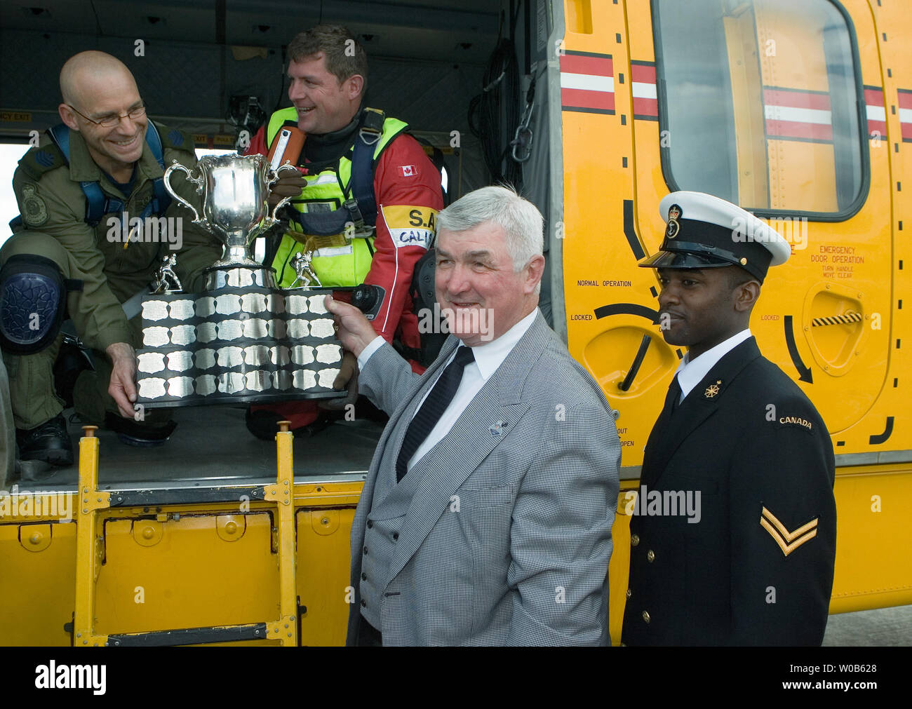 Sgt. Phillipe Robin (L) and Sean Callis from 442 Squadron on the CH149 ...
