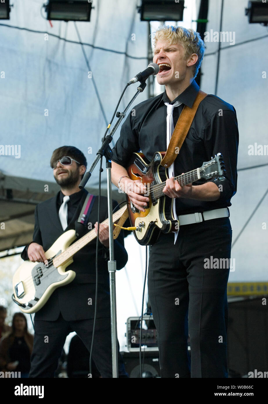 Lead singer Ryan Guldemond (R) with bass guitarist Jeremy Page perform ...