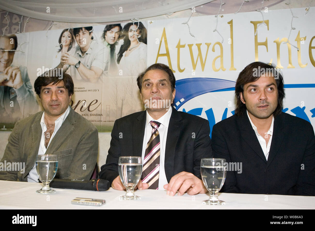 Bollywood star Dharmendra Deol with his sons Bobby (R) and Sunny (L ...