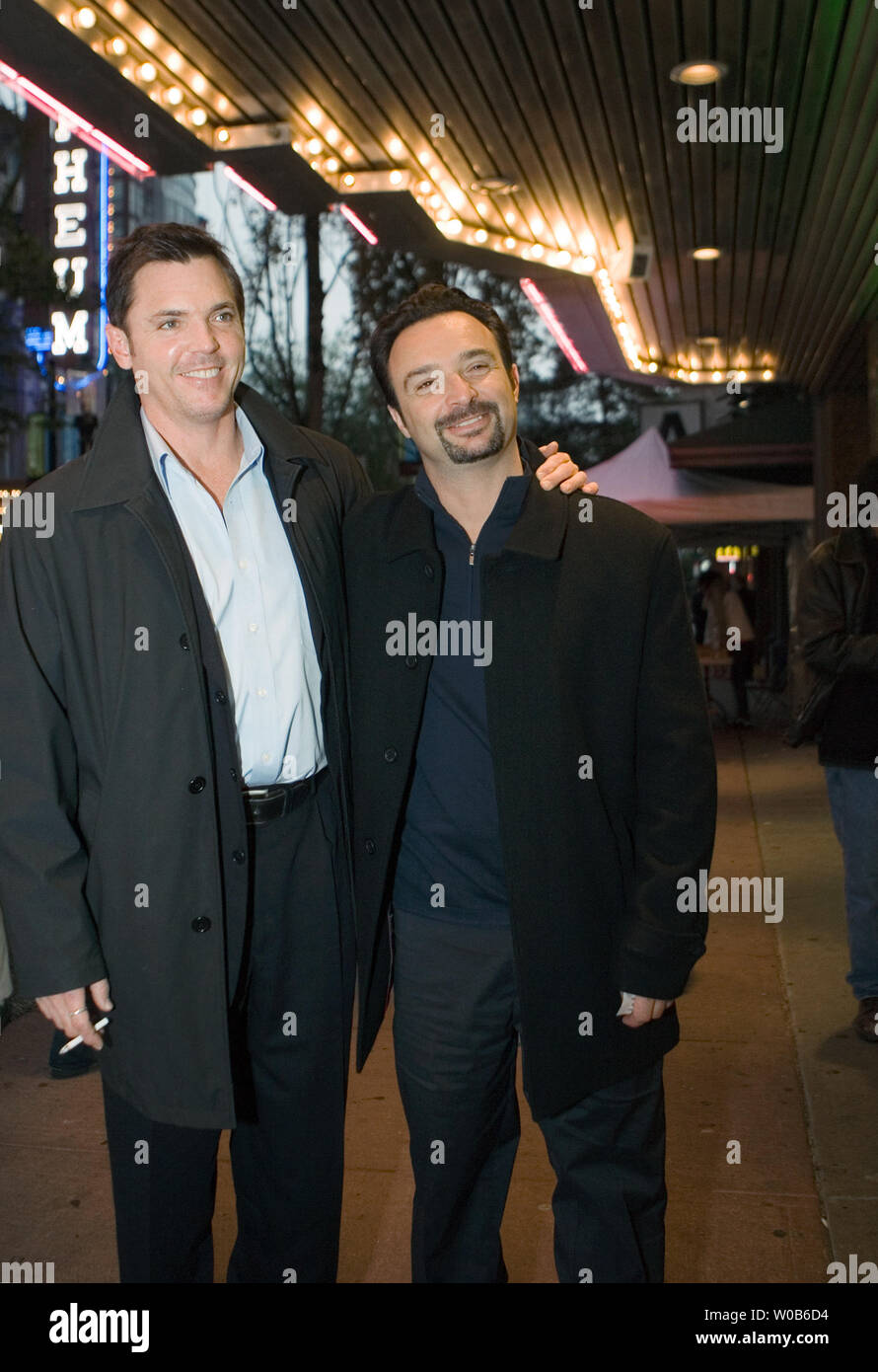 Actors Nicholas Lea (L) and John Cassini pose for photos as they arrive ...