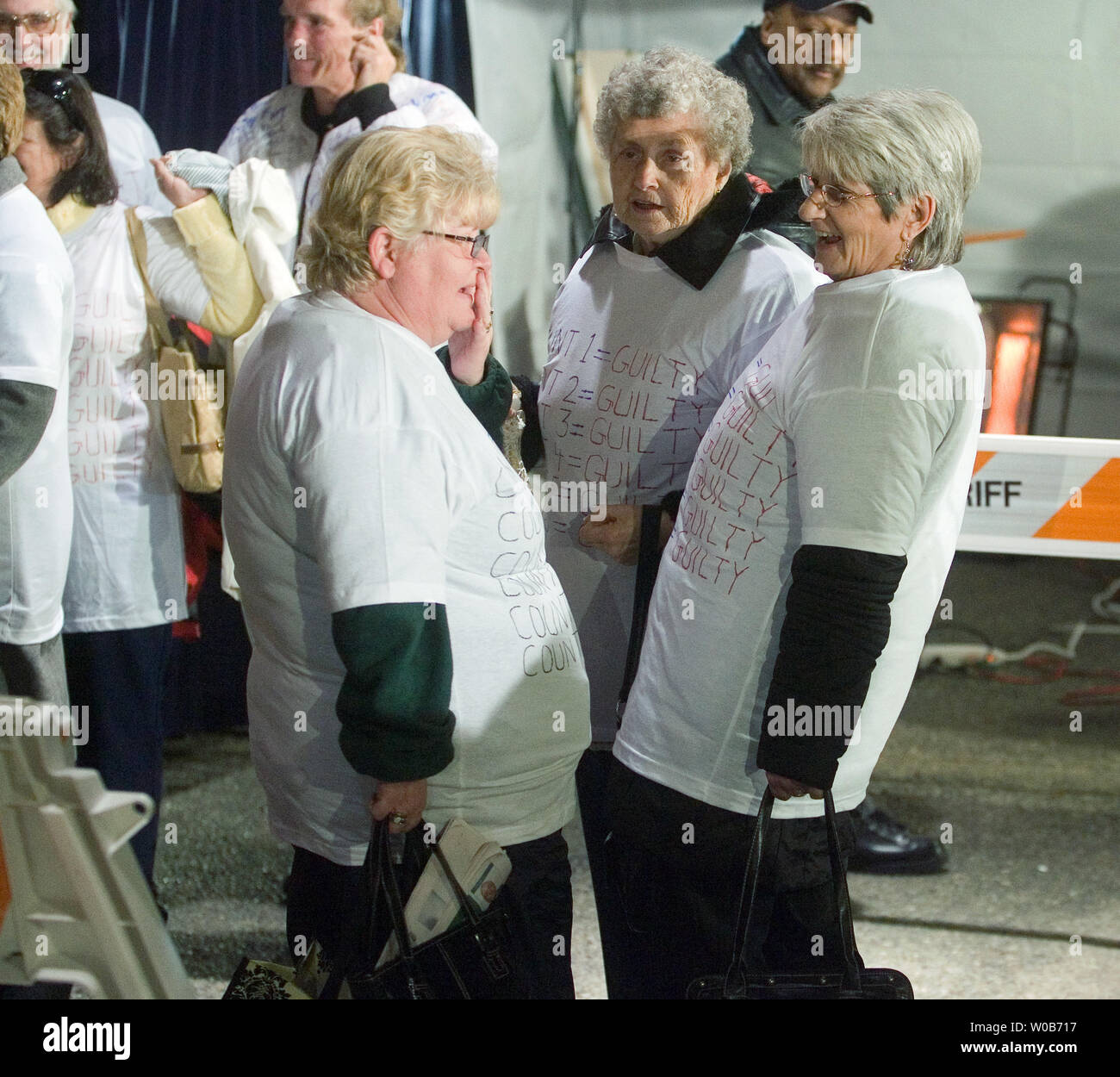 Family members of victims of the serial killer Robert Pickton wear t ...