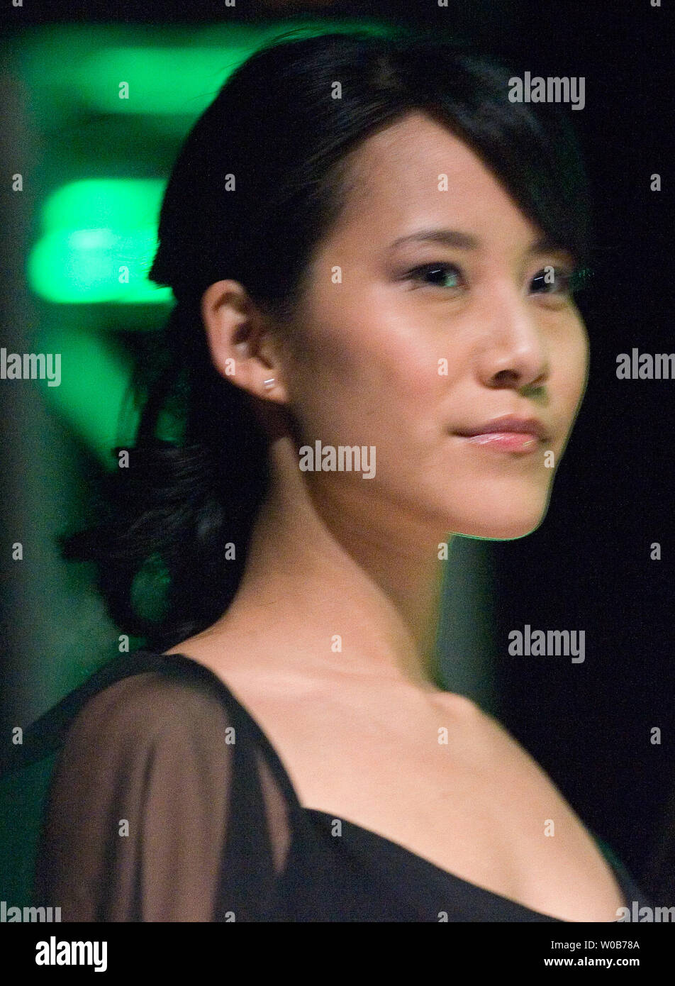 Actress Tammy Hui presents an award at the 2nd Annual Elans, Canadian ...