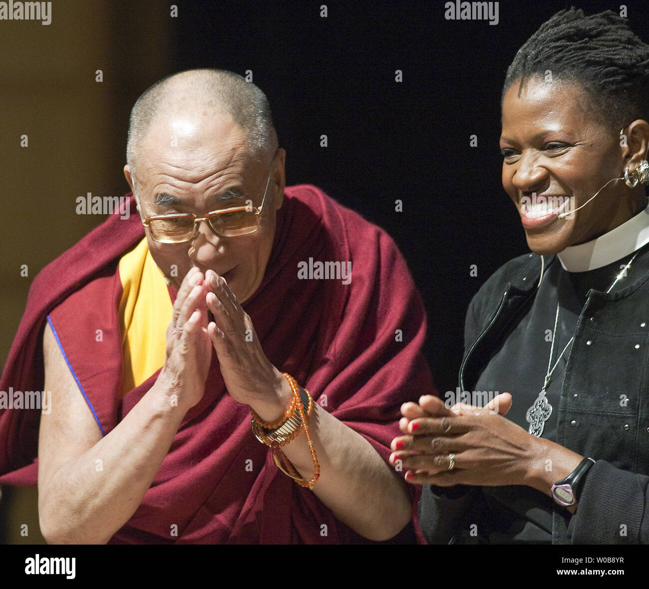 The Dalai Lama arrives onstage with Reverand Mpho Tutu for the 2009 ...