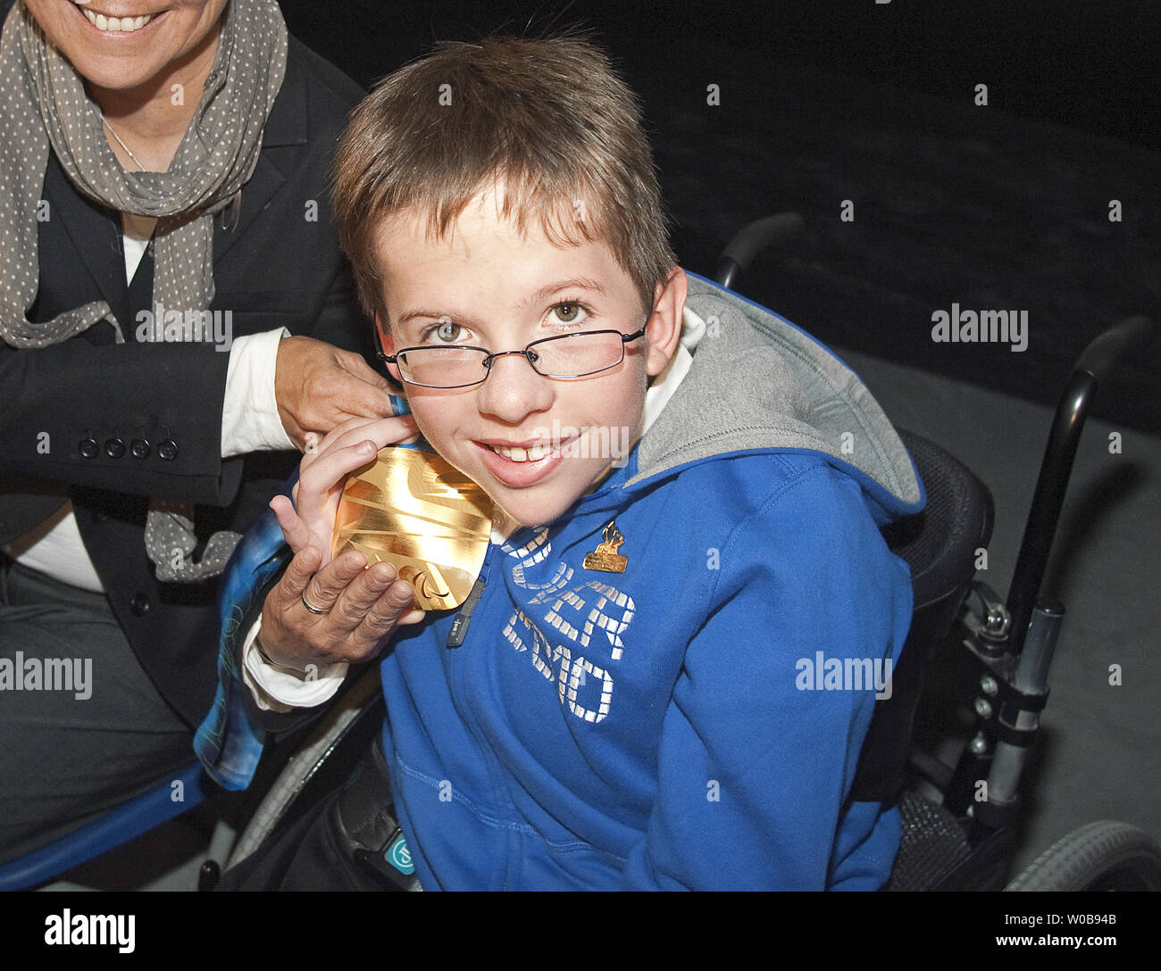 Local paraplegic student and athlete, Ben Dooley, 13-years-old, shows ...