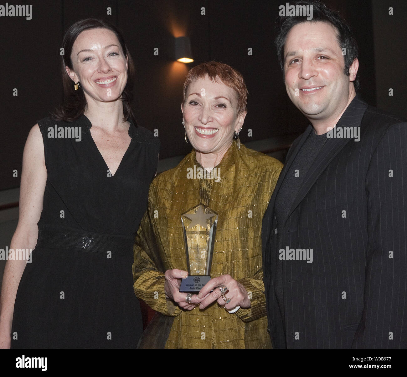 Actress and singer Babz Chula shown holding her "Woman of the Year ...