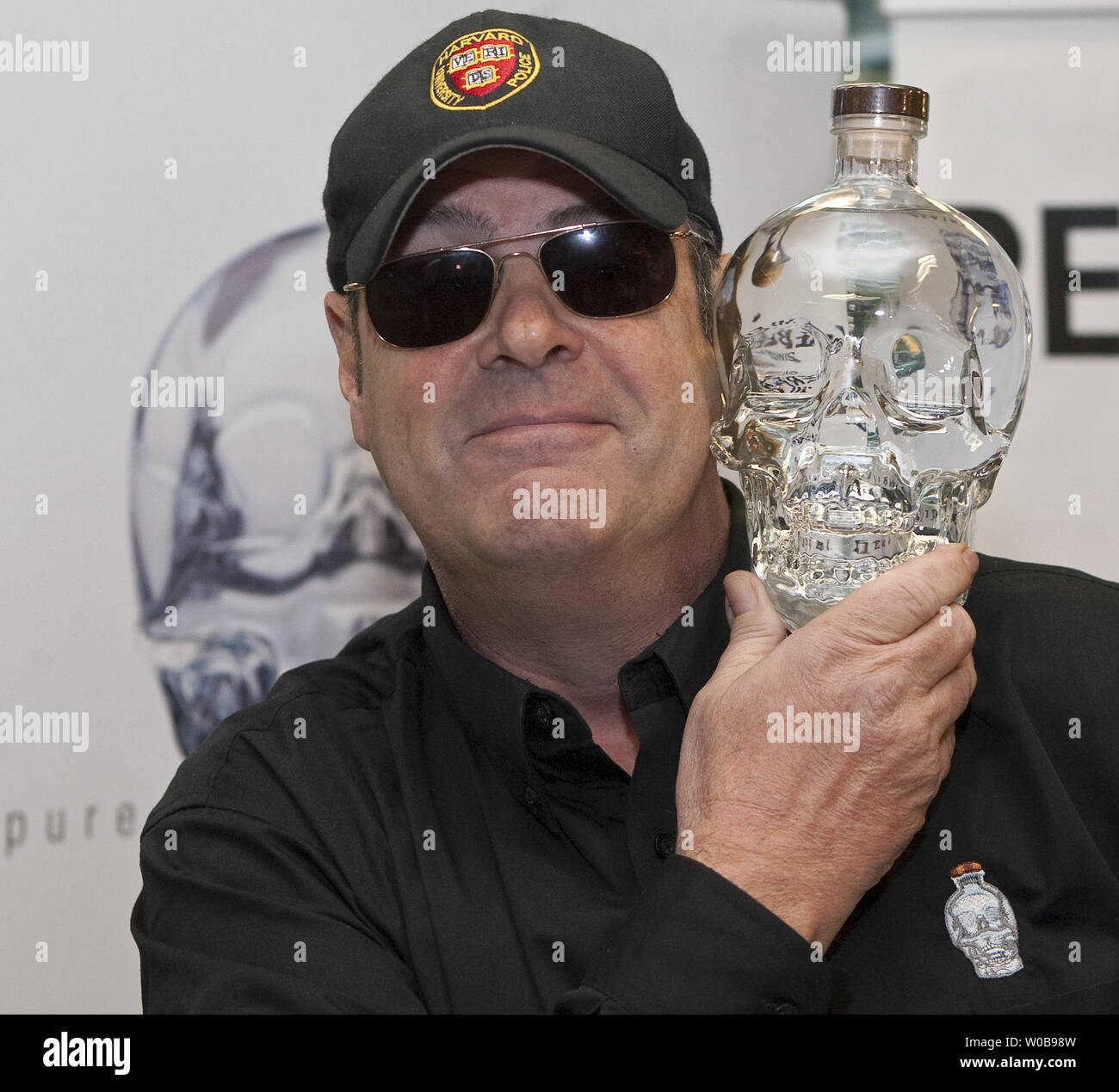 Actor Dan Aykroyd shows off a bottle of Crystal Head Vodka at the new ...