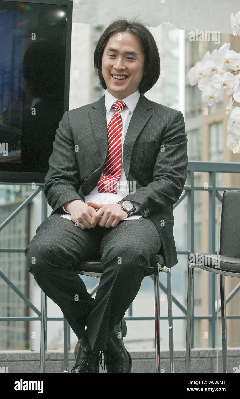 Joo Kim Tiah, CEO of the developer Holborn Group listens as Donald ...