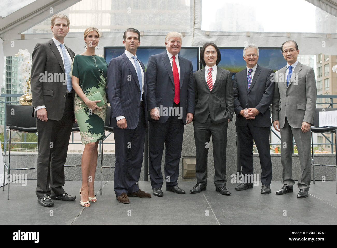 Donald Trump (centre) poses for a group photo with his daughter Ivanka ...