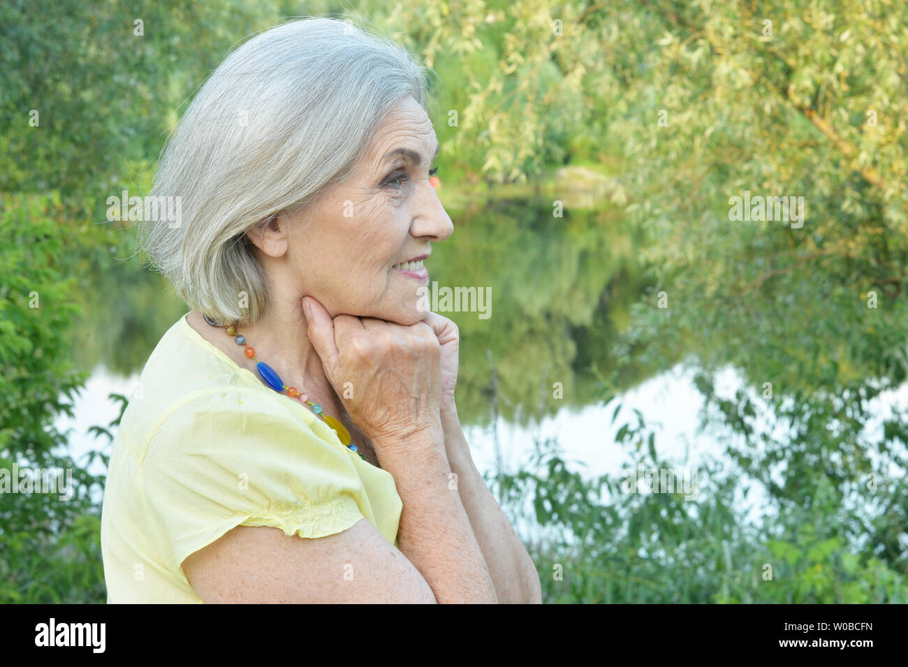 Portrait of happy smiling senior beautiful woman Stock Photo - Alamy
