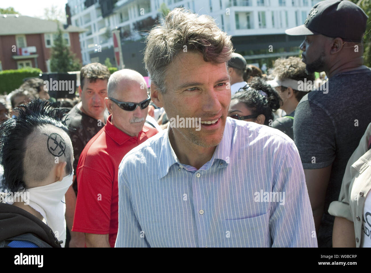 Vancouver Mayor Gregor Robertson speaks against racism joining ...