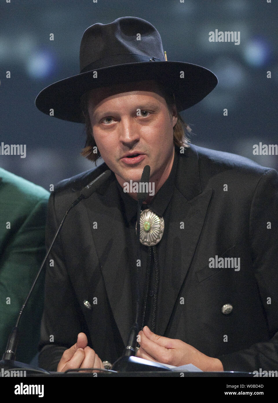 Lead singer Win Butler speaks for Arcade Fire after they receive the ...