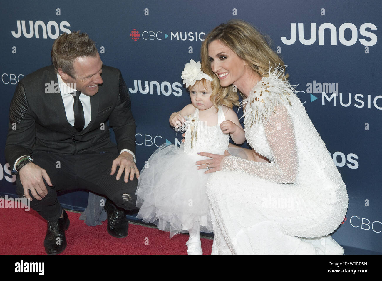 The Tenors Fraser Walters and his wife Kelly Levesque help baby ...